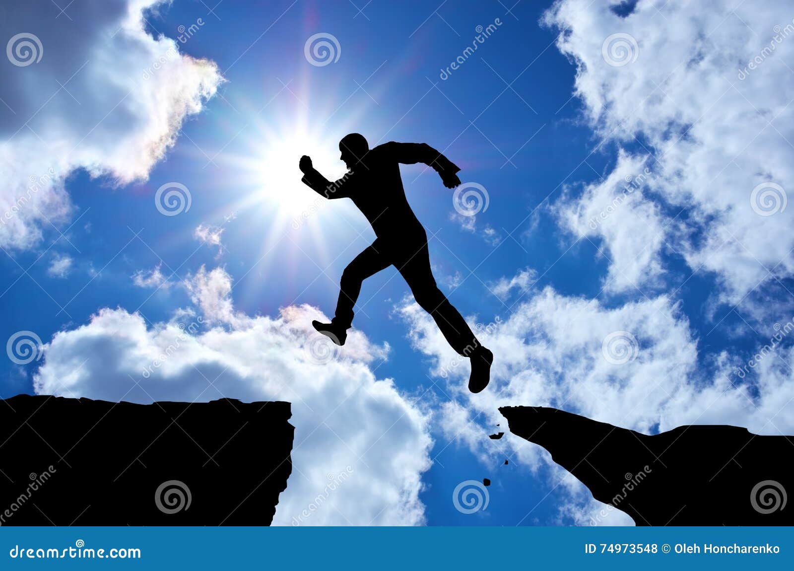 Man jump through the gap. stock photo. Image of life - 74973548