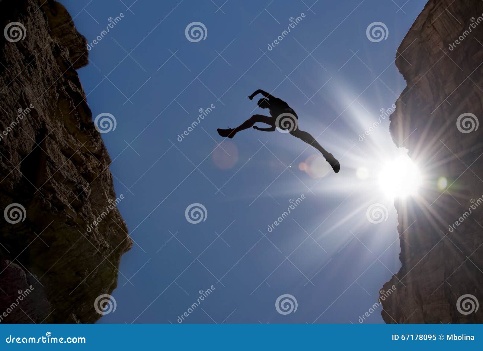 Man Jump Through The Gap In The Mountain Stock Image - Image of goal ...