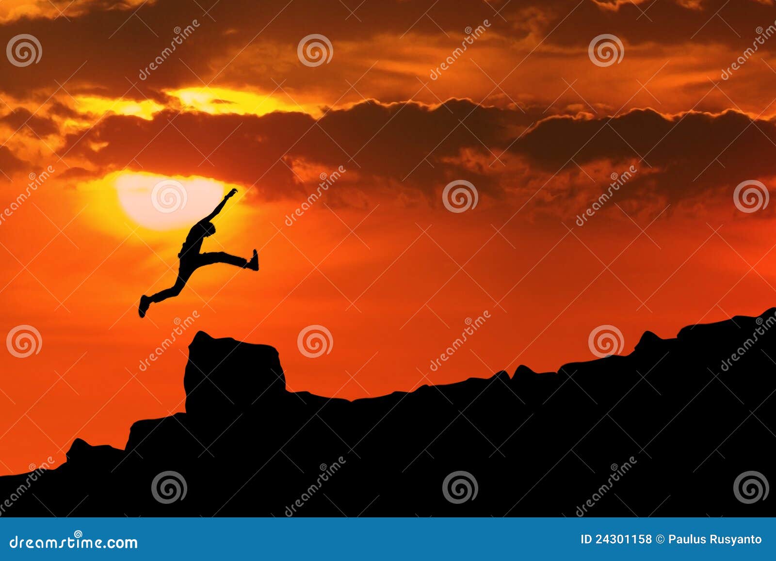 Man jump through the rock stock photo. Image of leap - 24301158