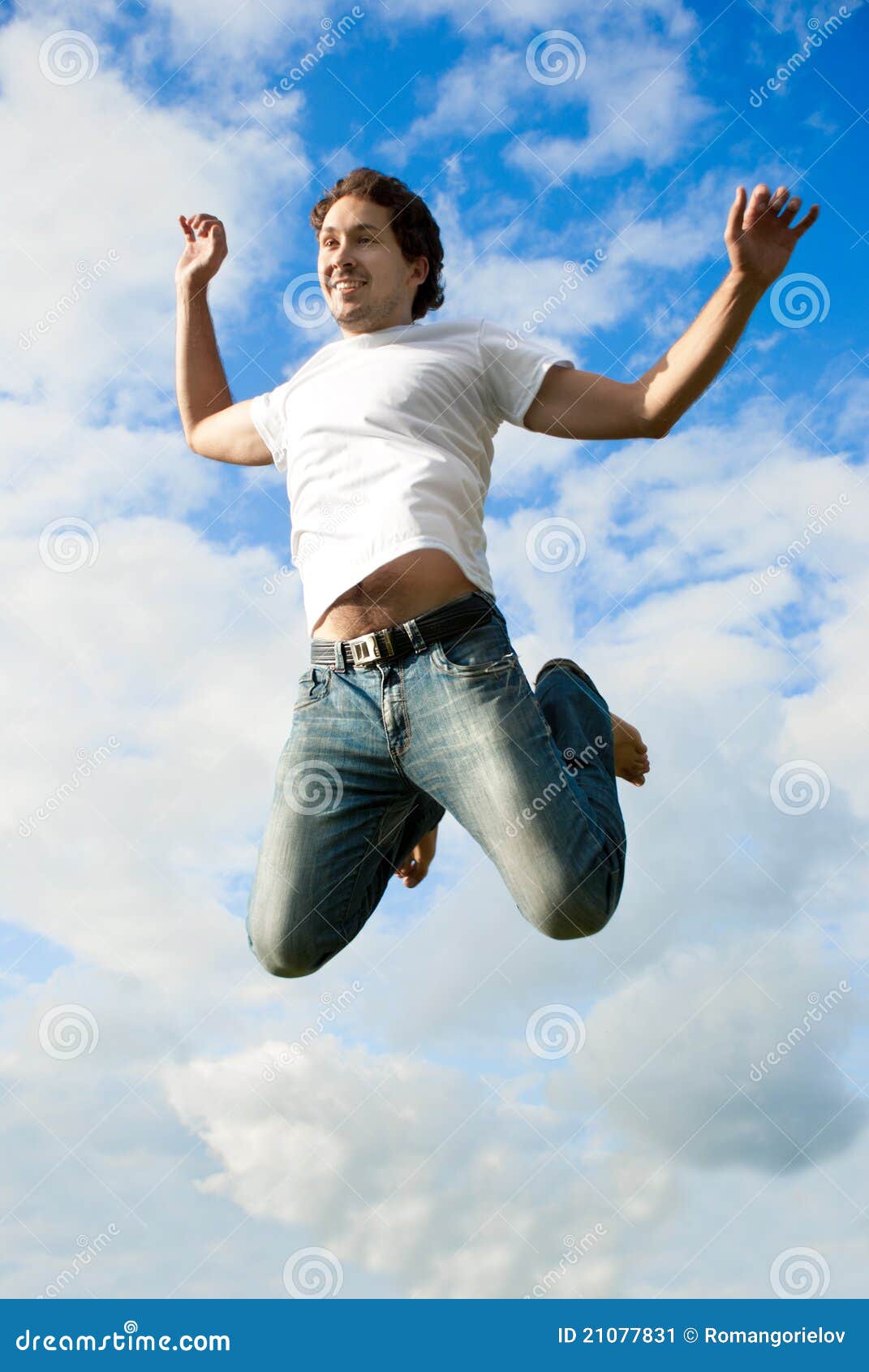 Man jumping stock image. Image of excitemant, jeans, action - 21077831