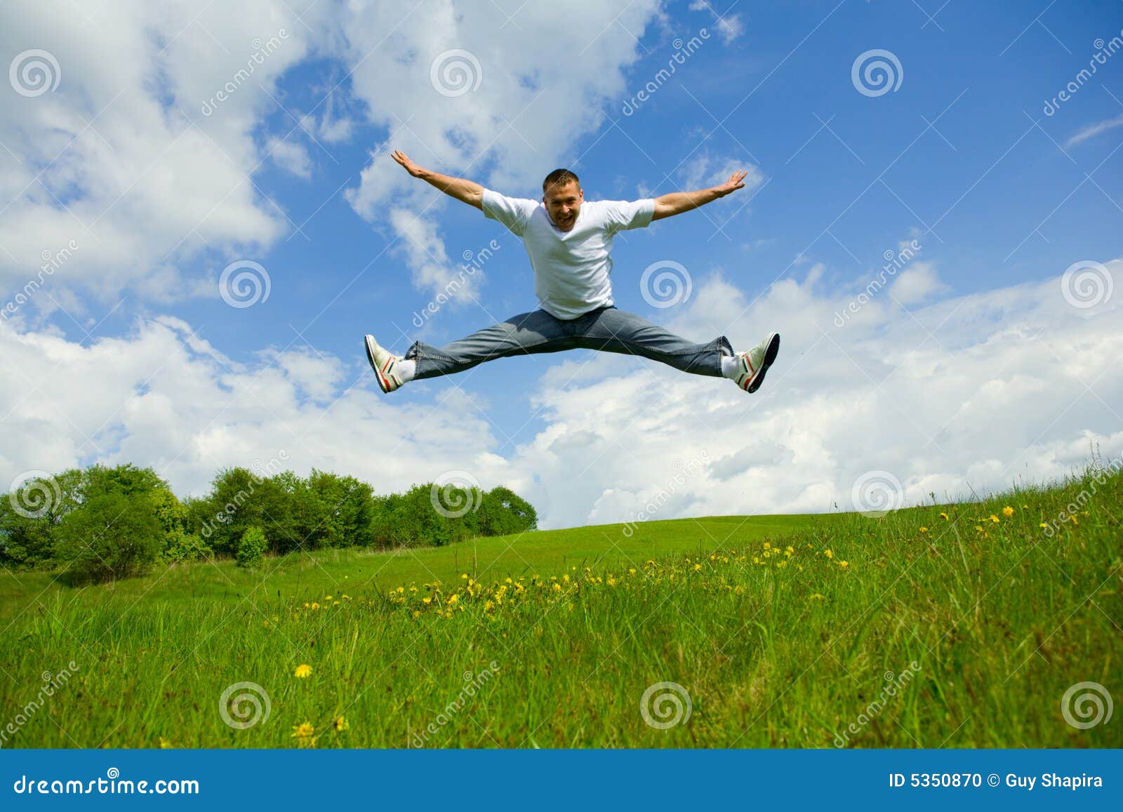 The man jumping stock photo. Image of dandelion, field - 5350870