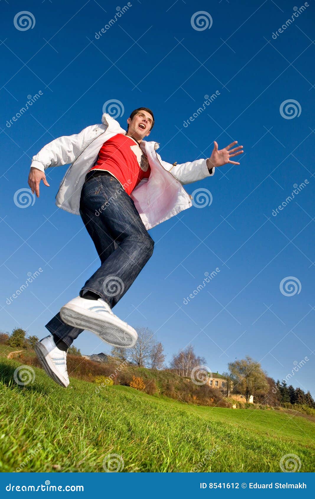 Man jumping stock photo. Image of jeans, shoes, victory - 8541612