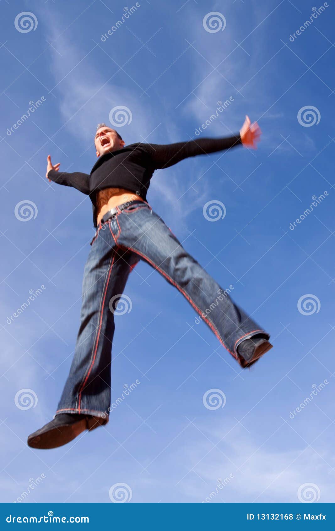 Man jumping in the air stock photo. Image of fashionable - 13132168