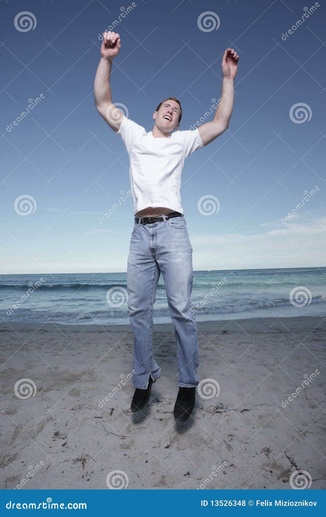 Man jumping on the beach stock photo. Image of copy, jumping - 13526348