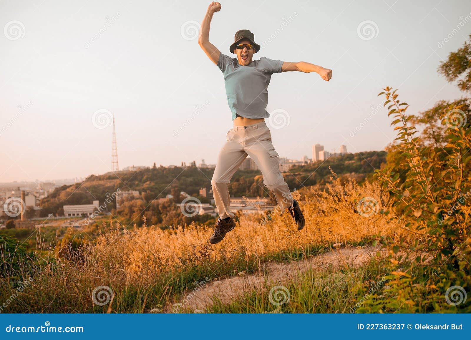 A Man Jumping from Excitement and Looking Happy Stock Image - Image of ...