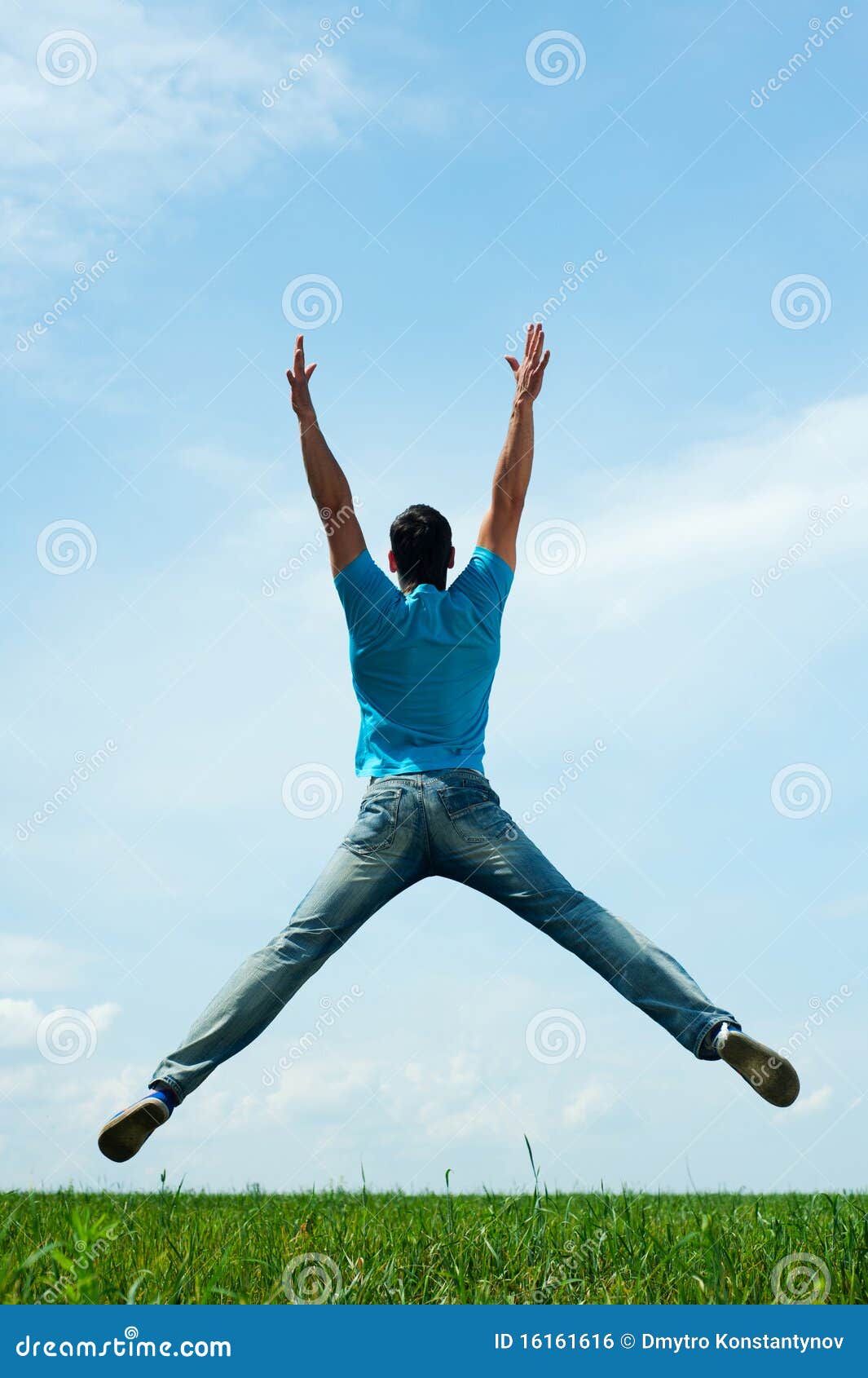 Man jumping on the field stock photo. Image of healthy - 16161616