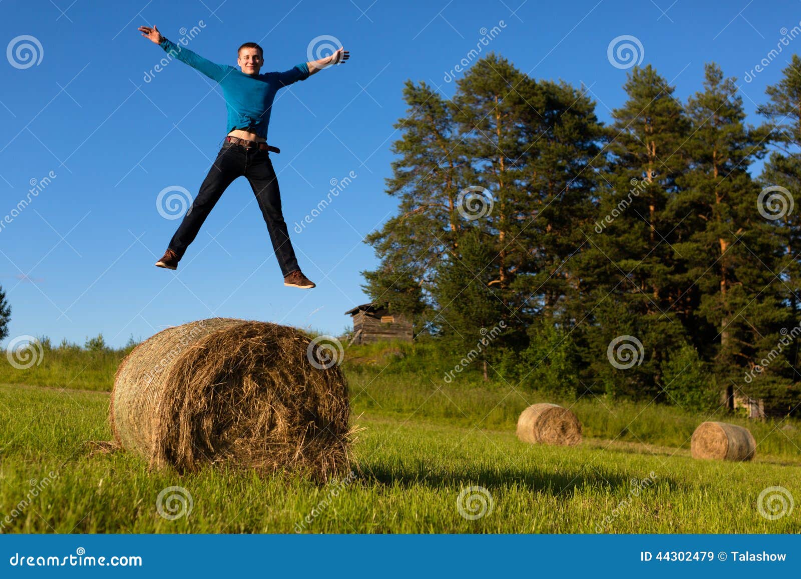 Man jumping in a field stock image. Image of action, summer - 44302479