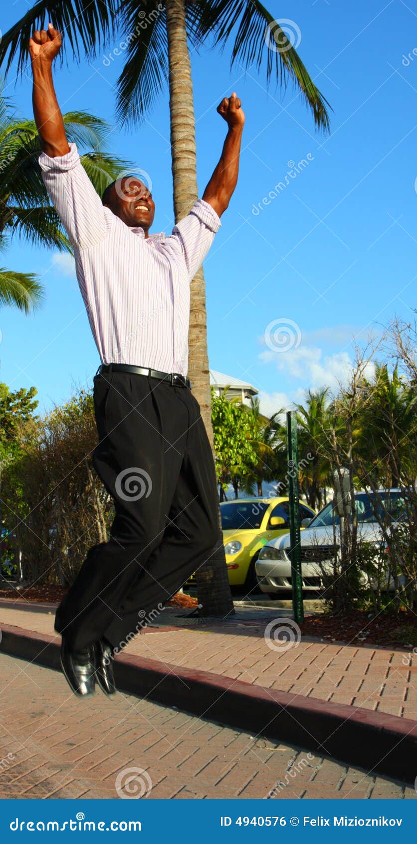 Man Jumping for joy stock photo. Image of pleased, leap - 4940576