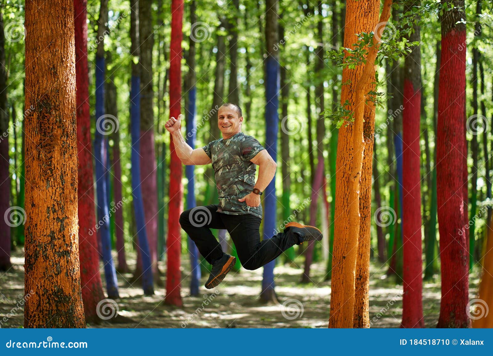 Man jumping for joy stock photo. Image of posing, portrait - 184518710