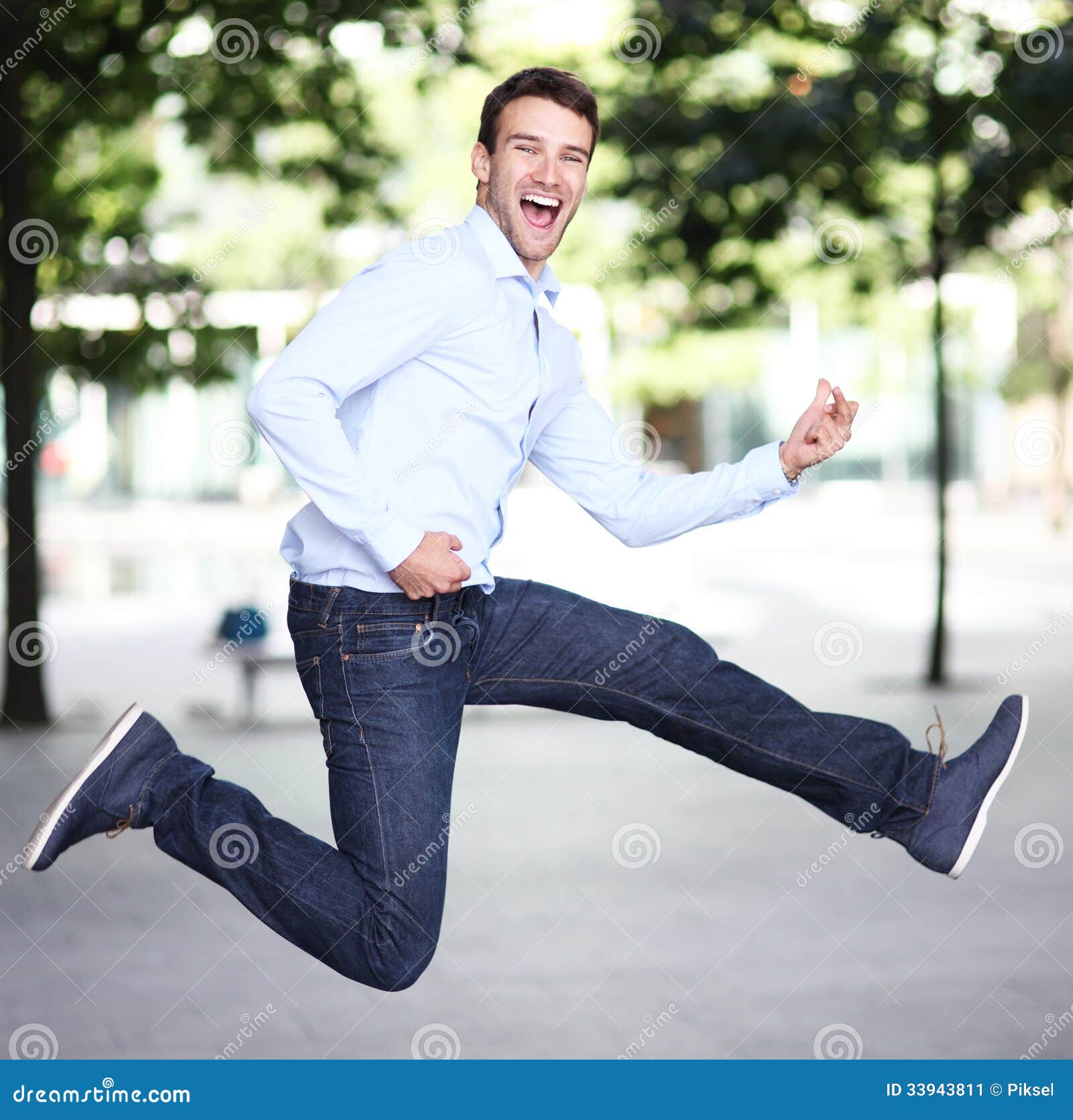 Man jumping with joy stock image. Image of clenching - 33943811