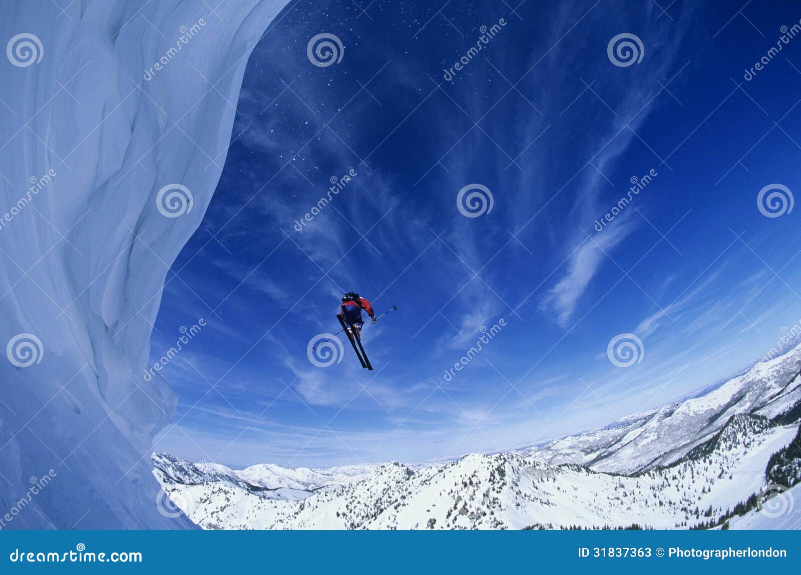 Man Jumping from Mountain Ledge Stock Image - Image of hobby, action ...