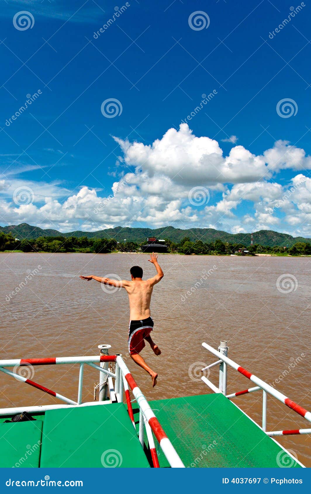 Man Jumping Off River Raft into Water Stock Image - Image of vessel ...