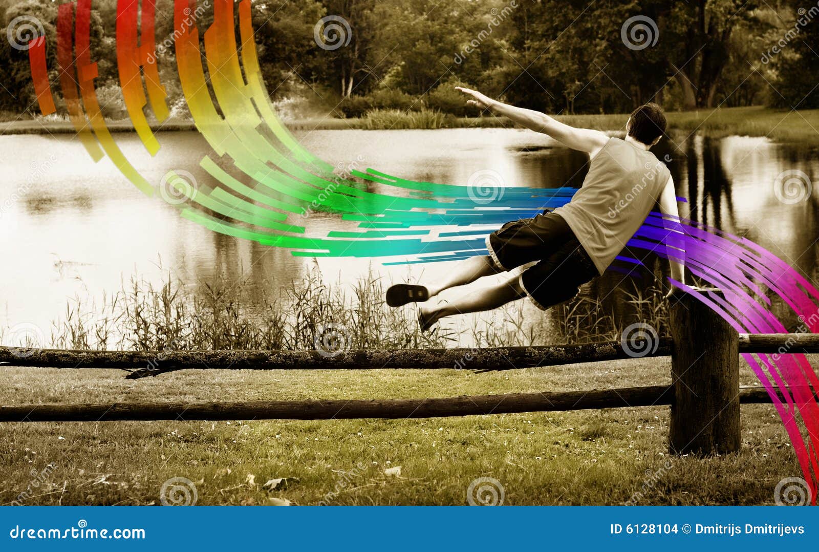 Man Jumping Over the Fence on the Rainbow Stock Photo - Image of ...