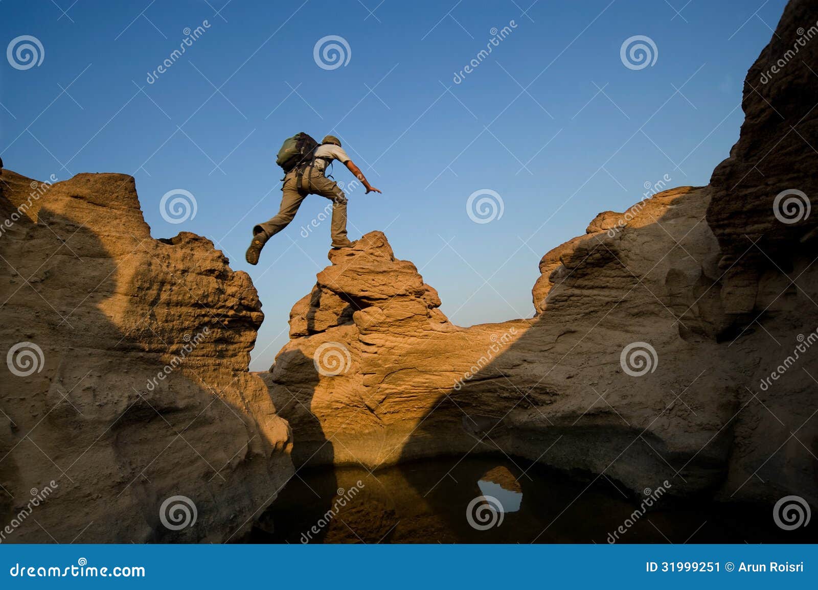 Man jumping over rocks stock image. Image of high, outdoor - 31999251