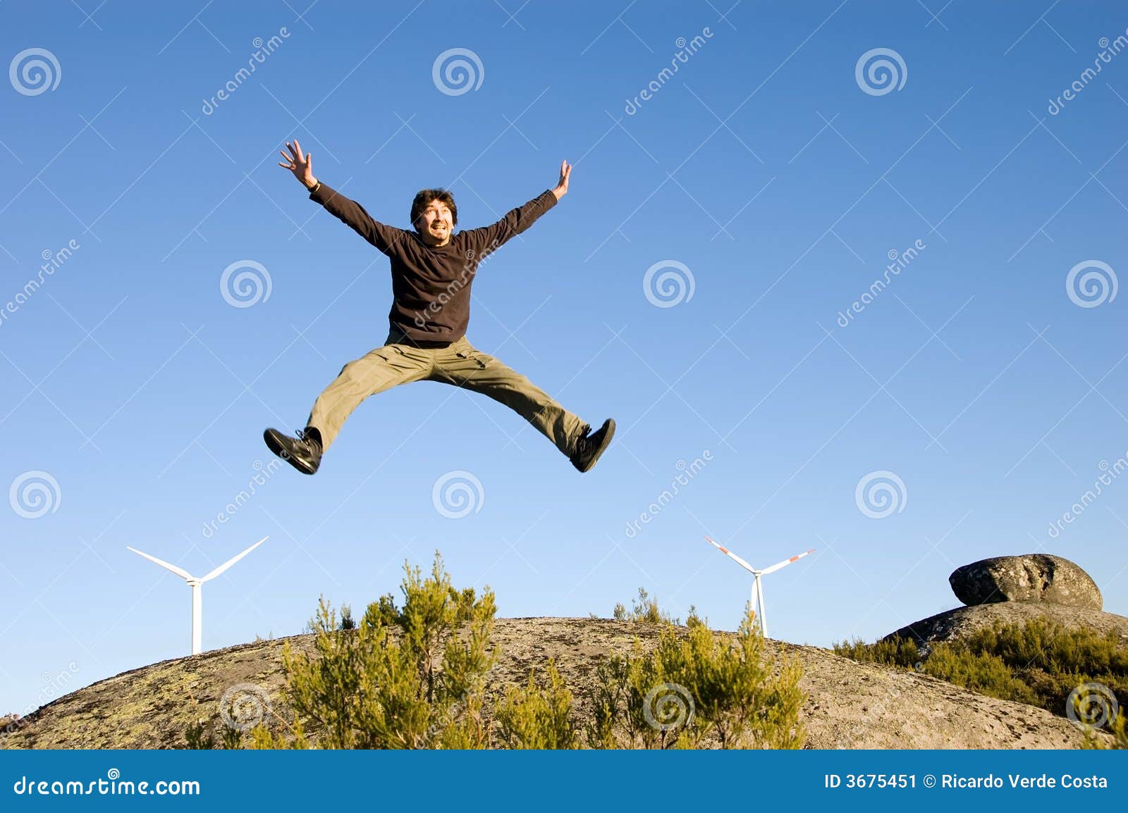 Man jumping on rocks stock image. Image of jump, living - 3675451