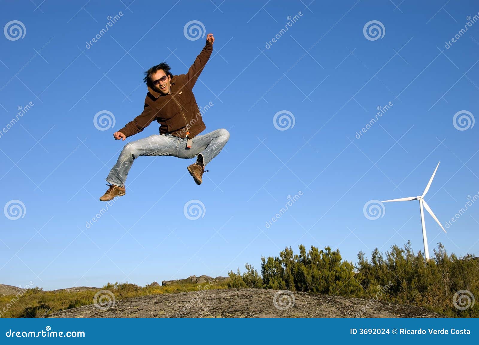 Man jumping on rocks stock photo. Image of sand, healthy - 3692024