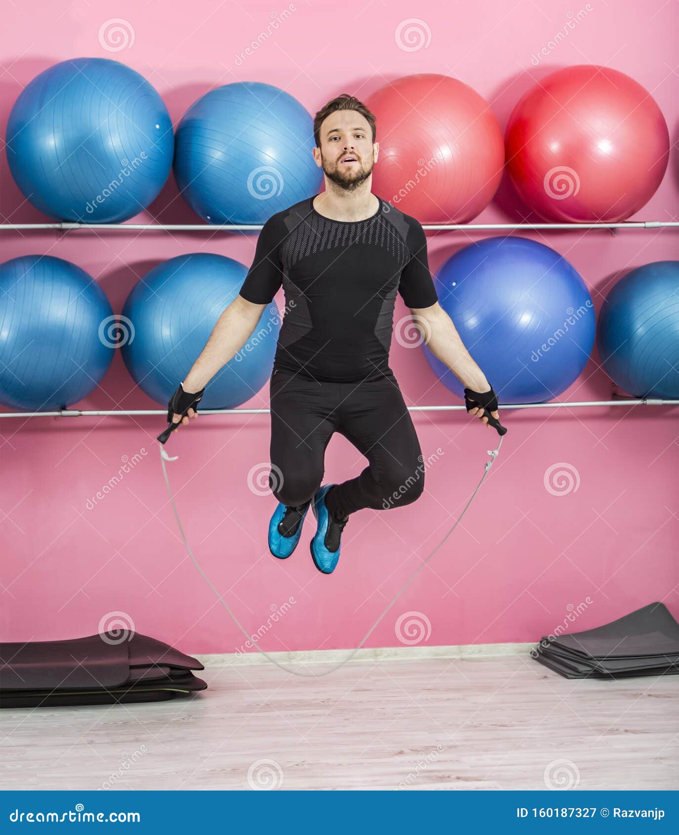 Man Jumping the Rope stock image. Image of athletic - 160187327