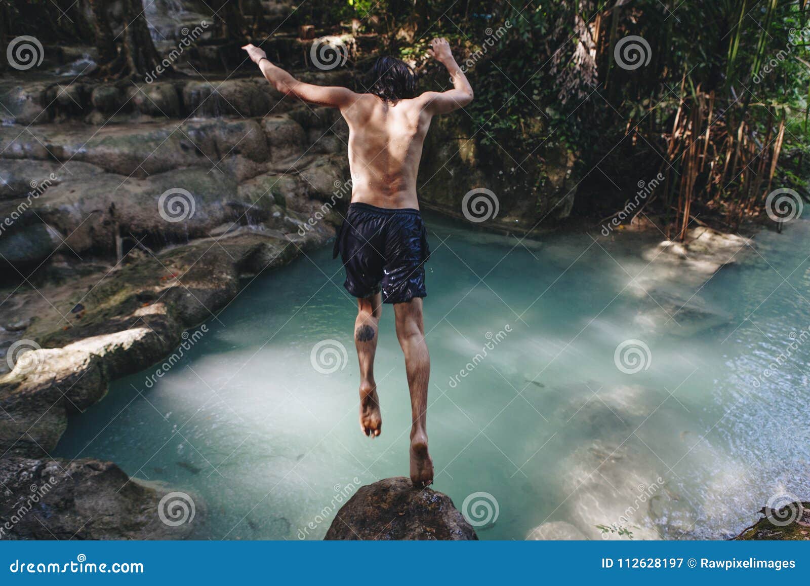 Man jumping into the water stock image. Image of isolated - 112628197