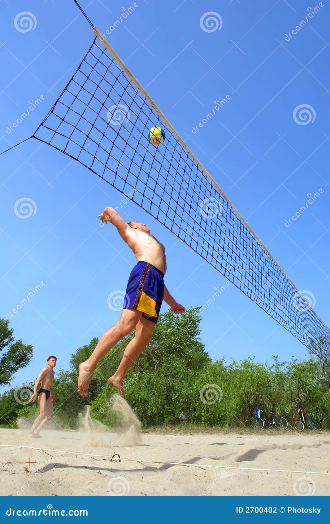 Man Jumps High To Spike Volleyball Stock Photo - Image of ball, summer ...