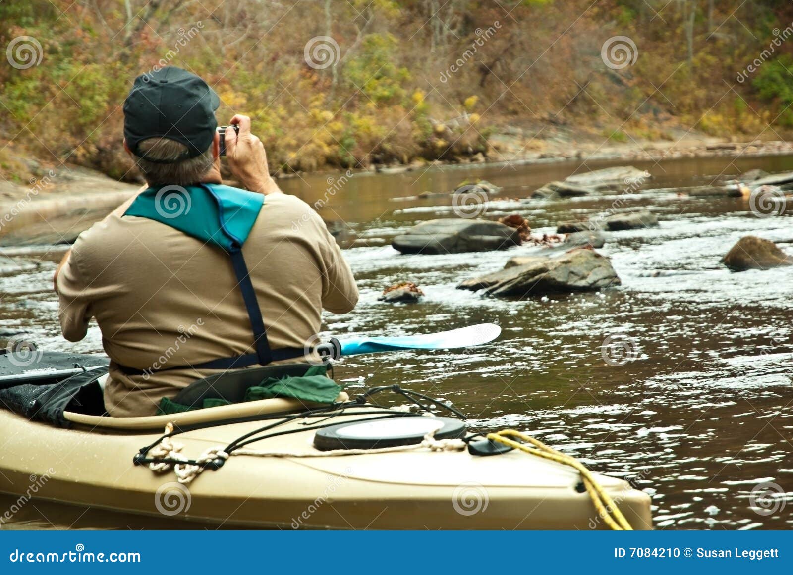 Man in Kayak Taking Pictures Stock Photo - Image of hobby, equipment ...