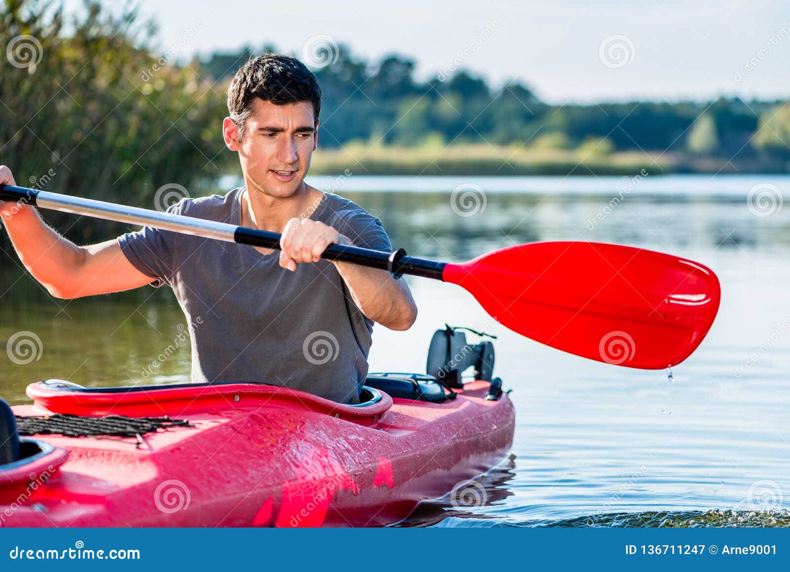 Man kayaking on lake stock image. Image of kayaking - 136711247