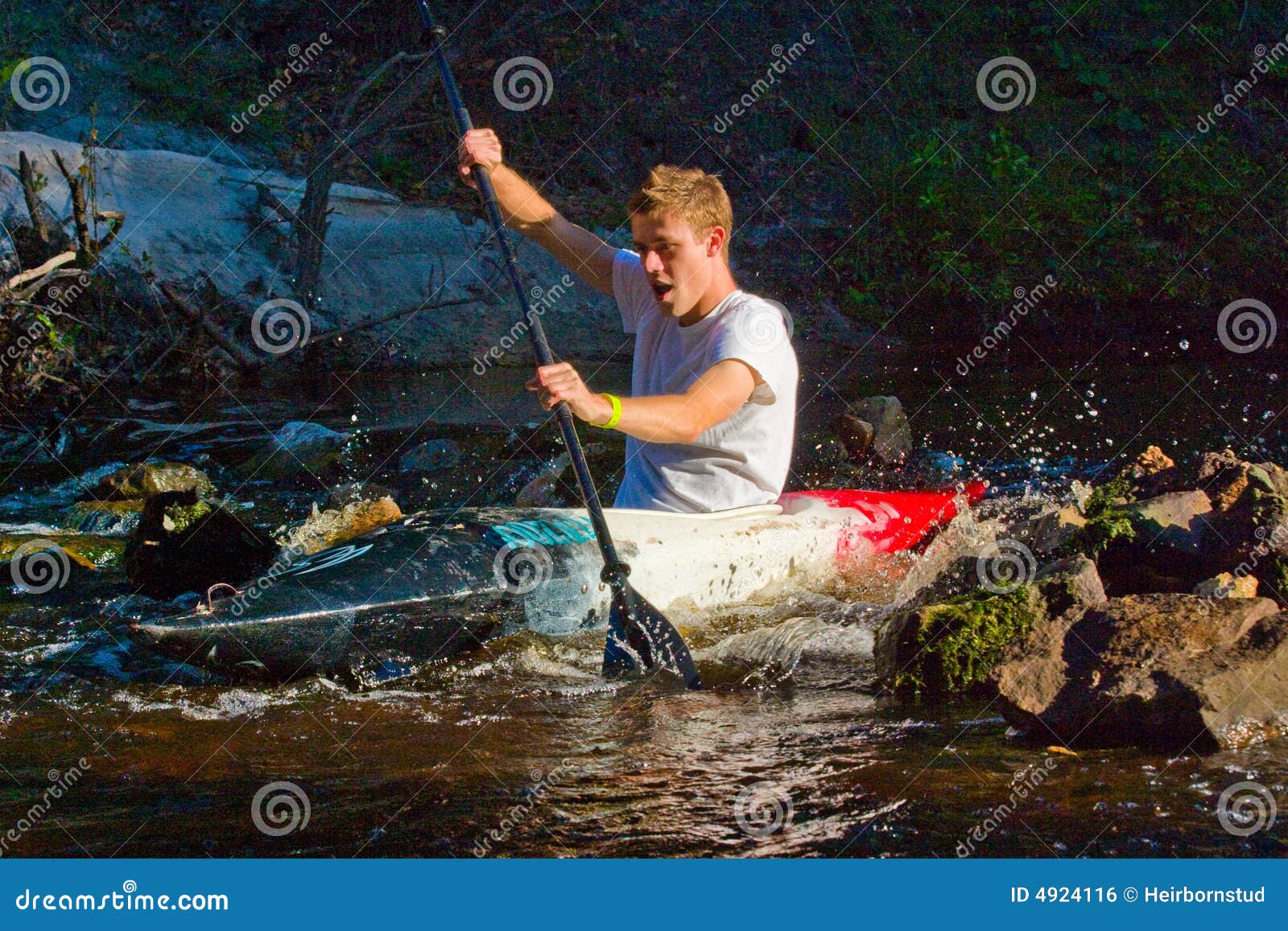 Man kayaking on river stock photo. Image of kayak, rocks - 4924116