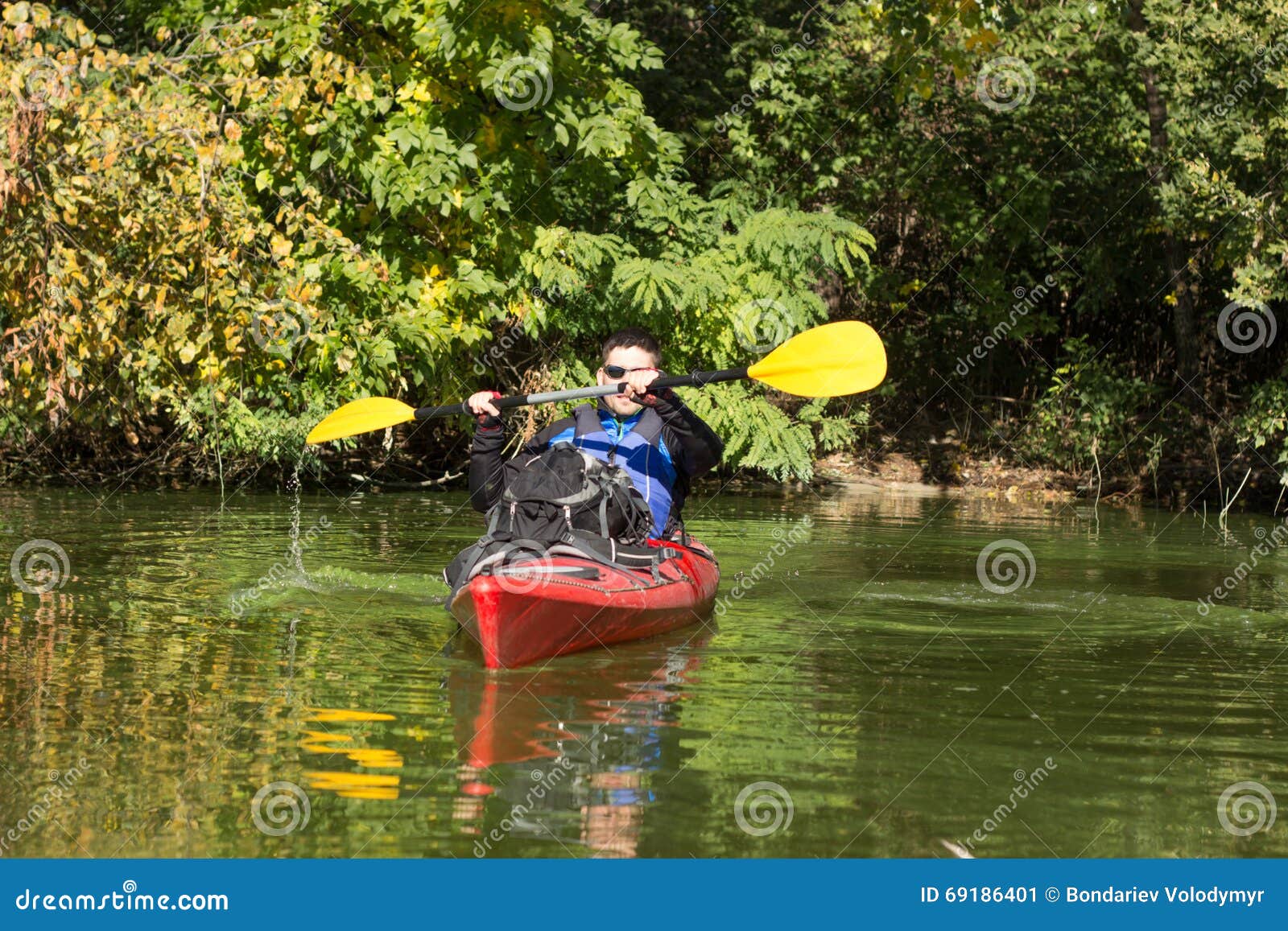The man is kayaking stock image. Image of canoe, life - 69186401