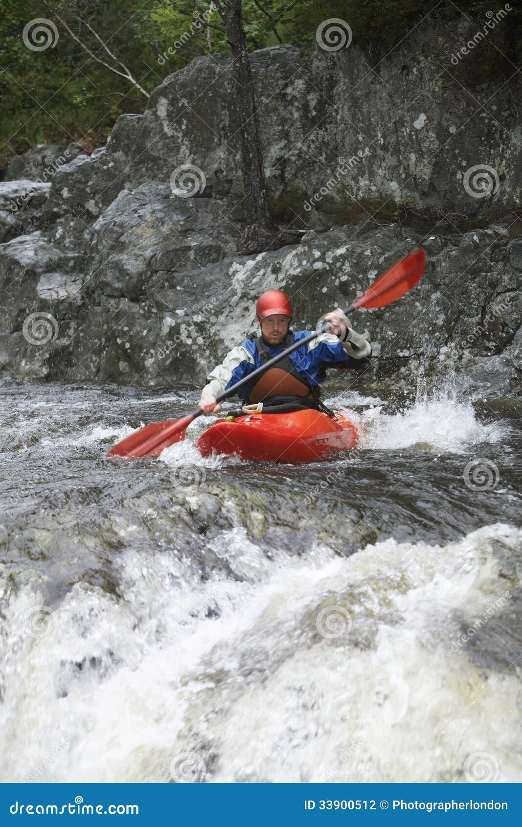 Man kayaking in river stock photo. Image of paddling - 33900512