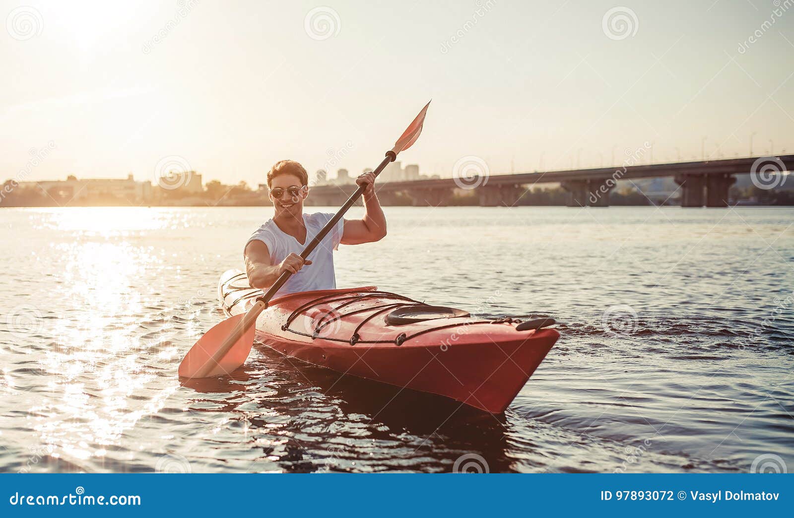 Man kayaking on sunset stock photo. Image of boat, pursuit - 97893072