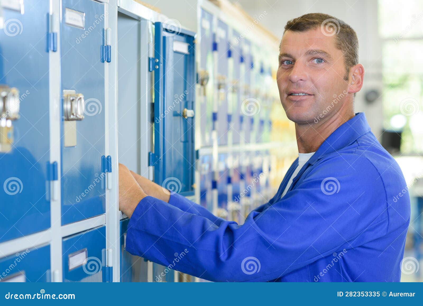 Man Keeping Belongings at Locker Room Stock Image - Image of specific ...