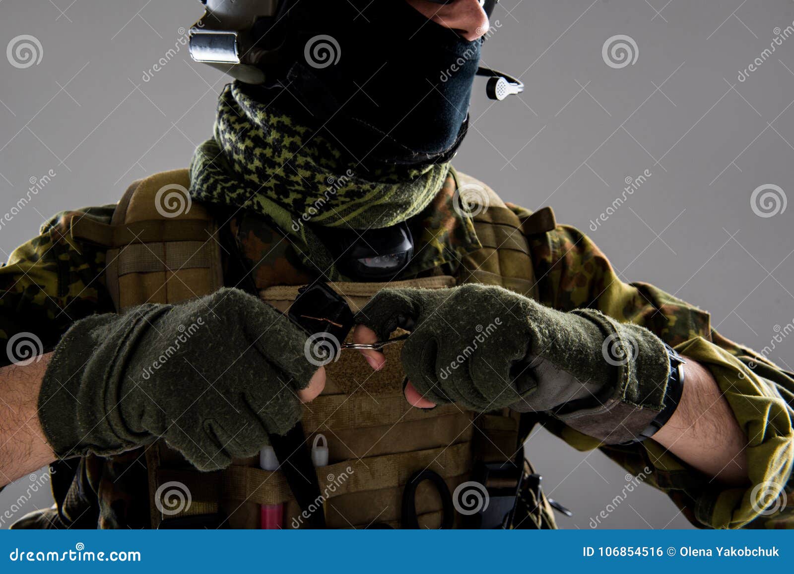Man Keeping Bombshell in Arms Stock Photo - Image of hand, armor: 106854516