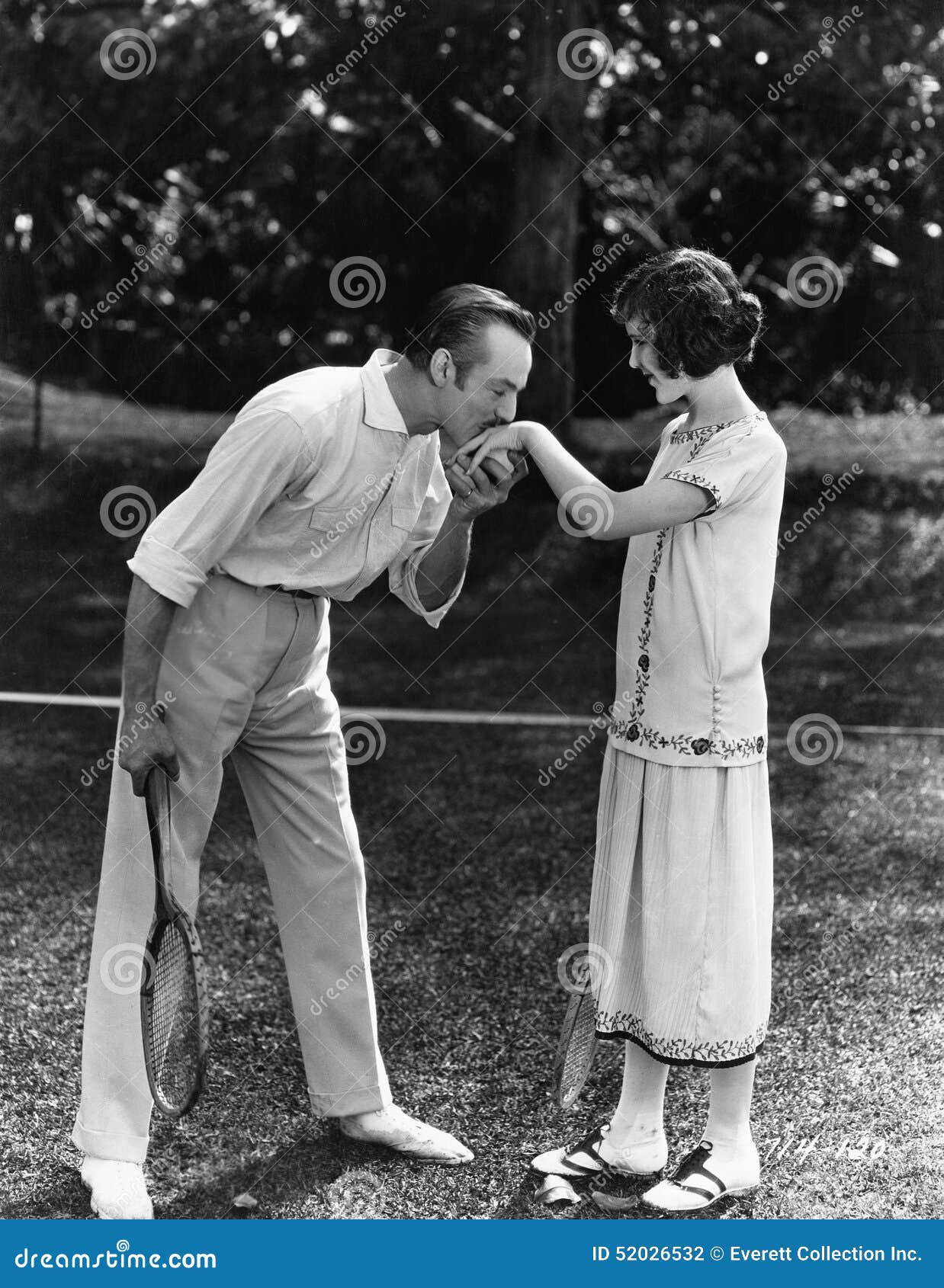 Man Kissing the Hand of a Woman Stock Photo - Image of casual, attire ...