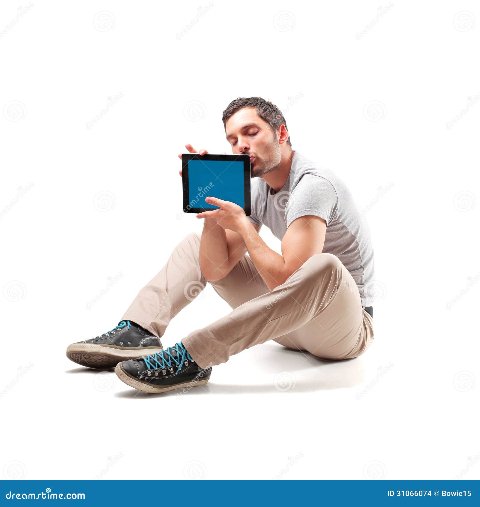 Man kissing a tablet stock photo. Image of touch, business - 31066074