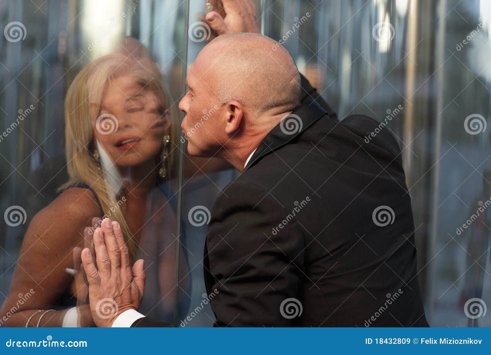 Man Kissing the Woman through the Glass Stock Image - Image of female ...