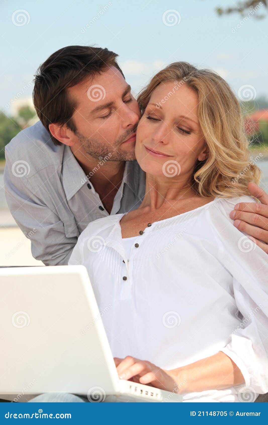 Man Kissing A Woman Tenderly Stock Image Image Of Portrait Computer