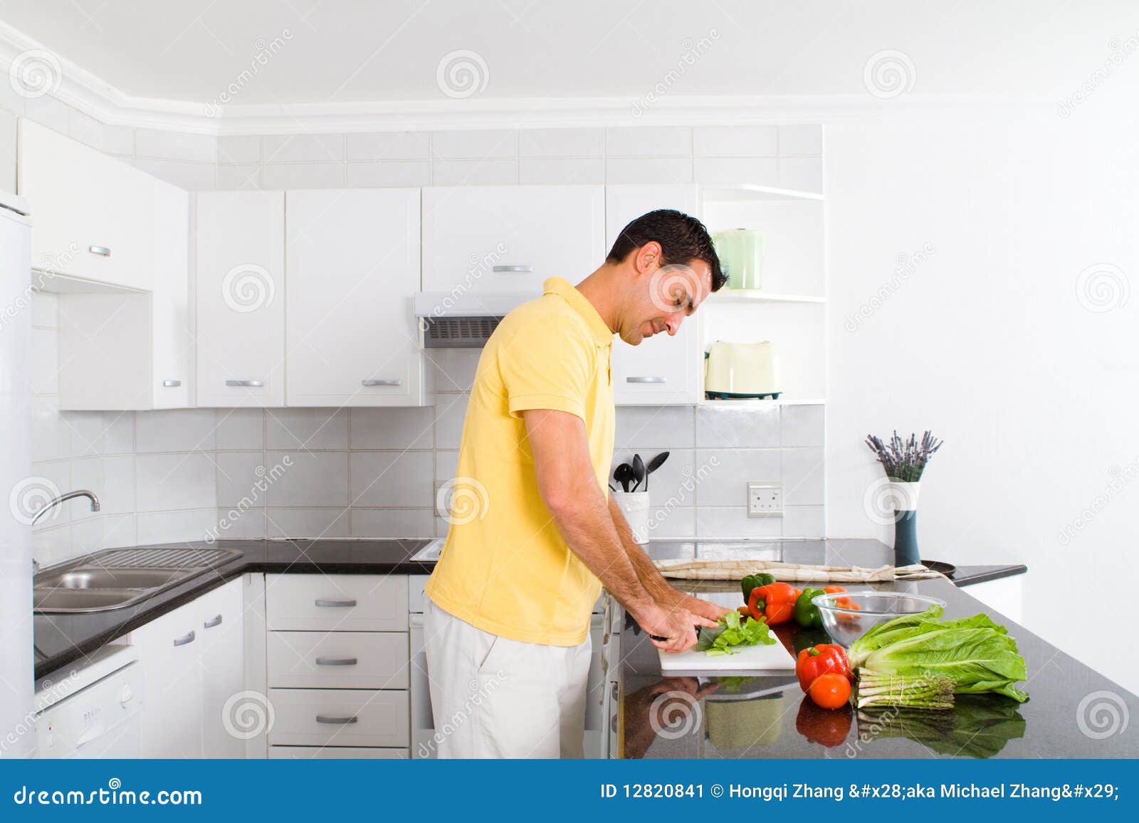 Man in kitchen stock image. Image of dinner, cooking - 12820841
