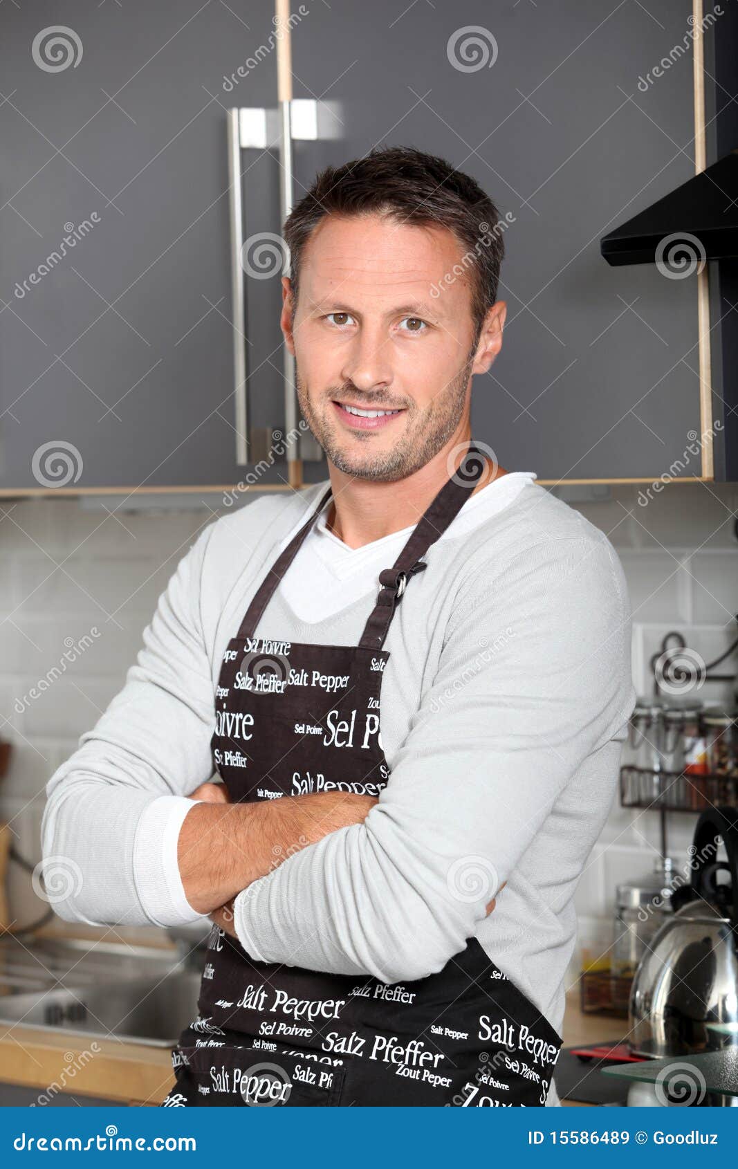 Man in kitchen stock image. Image of recipe, chores, smiling - 15586489