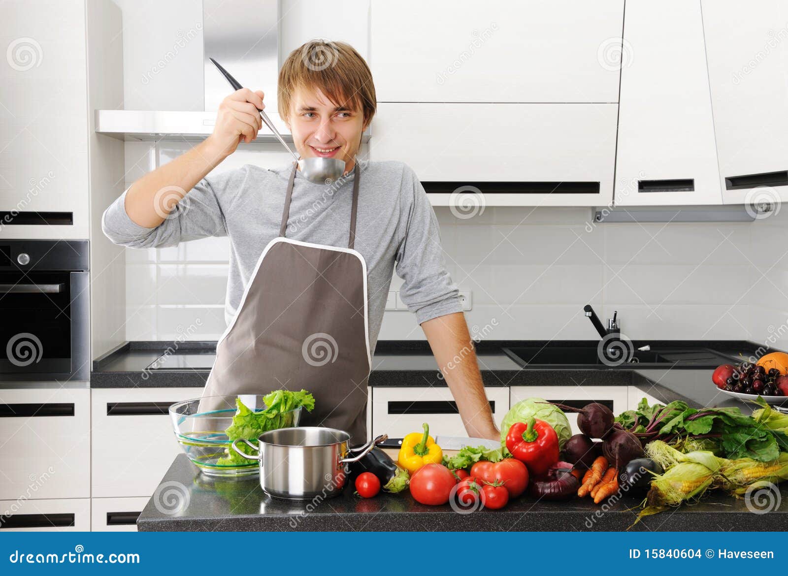 Man in kitchen stock photo. Image of male, food, interior - 15840604