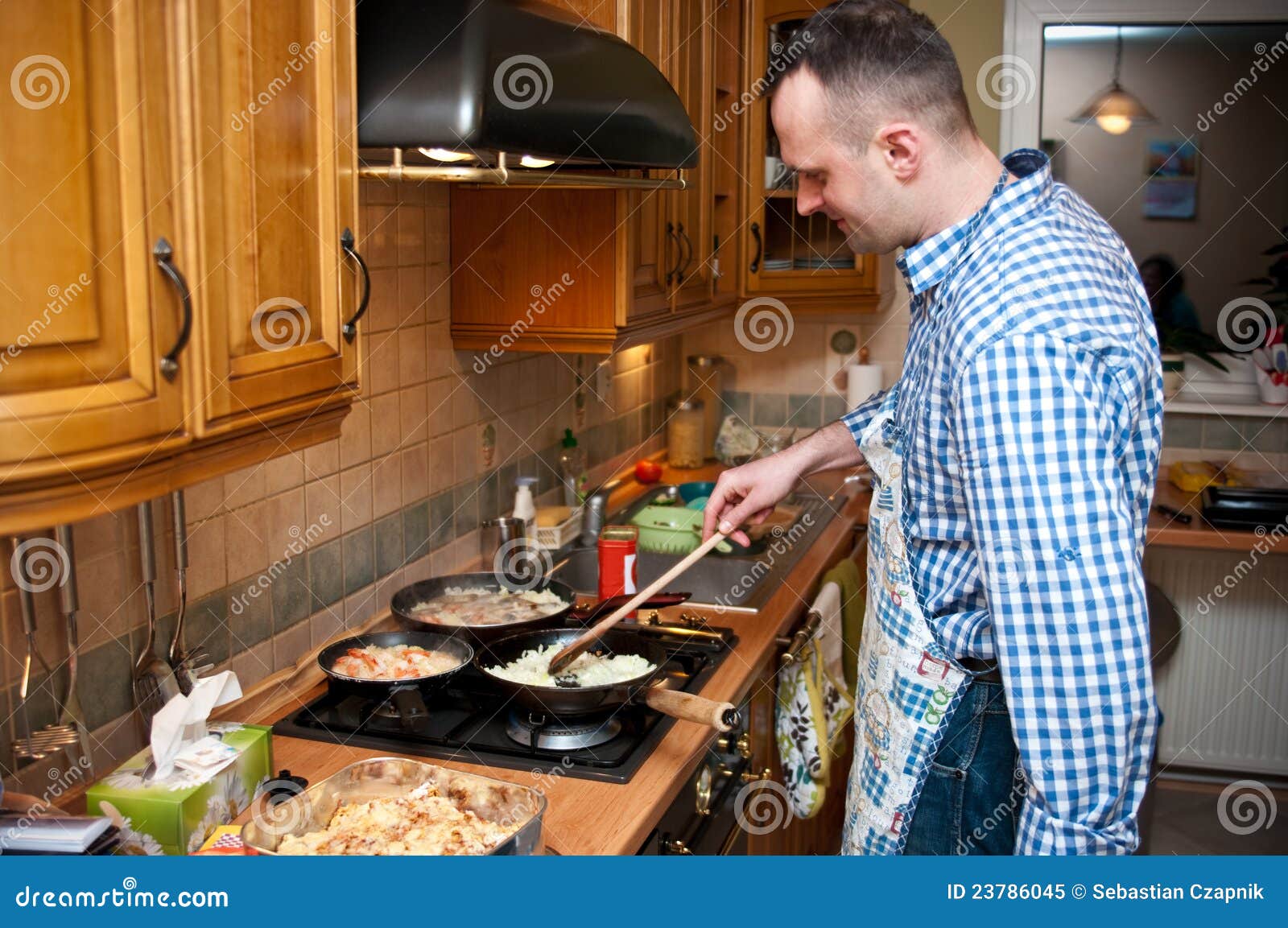 Man in kitchen stock image. Image of appliance, modern - 23786045