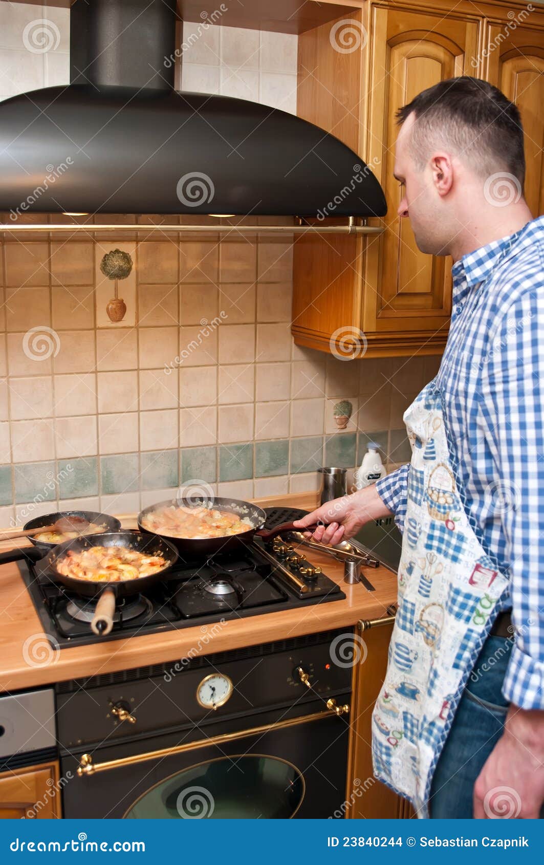 Man in kitchen stock photo. Image of cook, robe, mussels - 23840244
