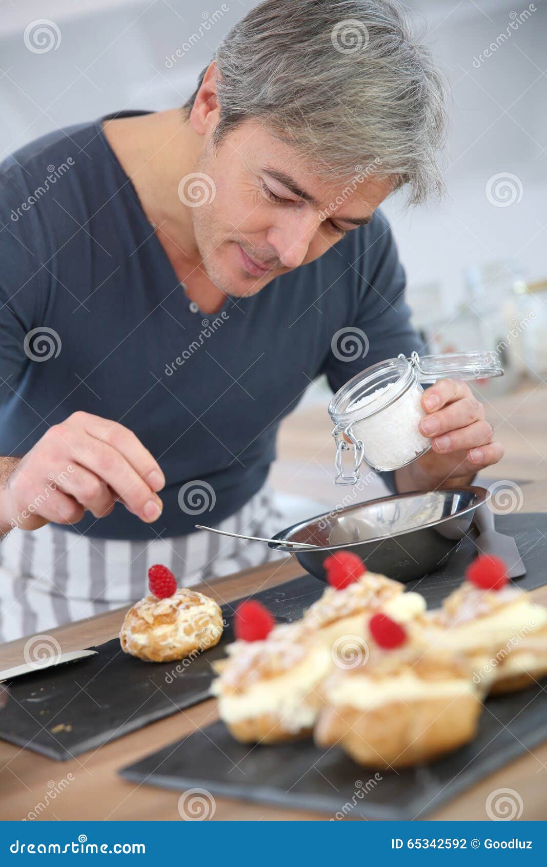 Man in Kitchen Baking Pastries Stock Photo - Image of smiling, puffs ...