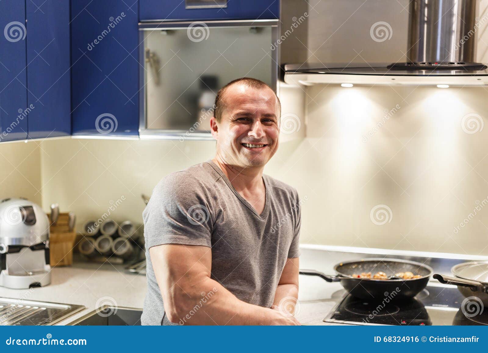 Man in the kitchen stock photo. Image of gourmet, male - 68324916