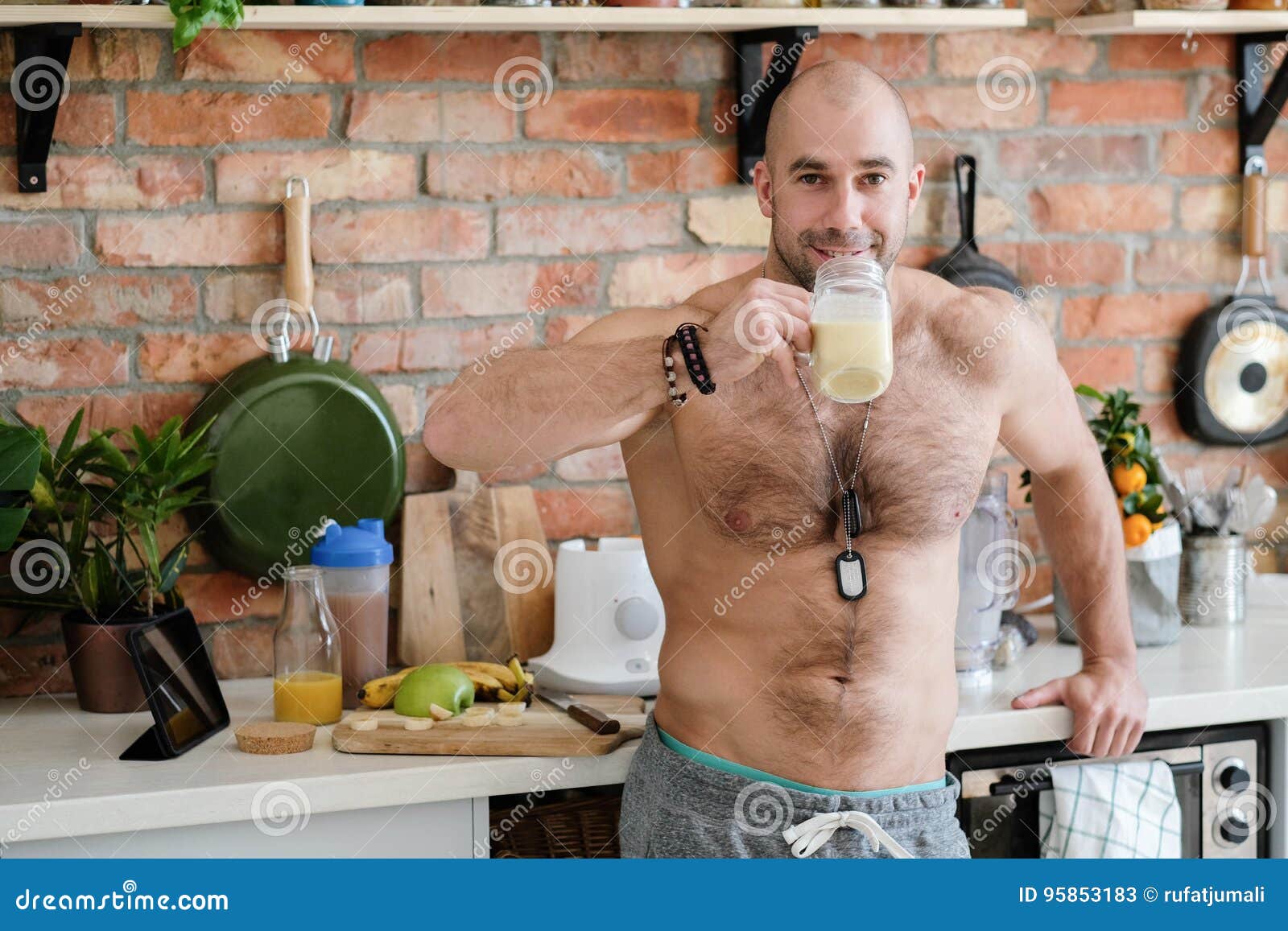 Man at kitchen stock image. Image of happy, kitchenware - 95853183