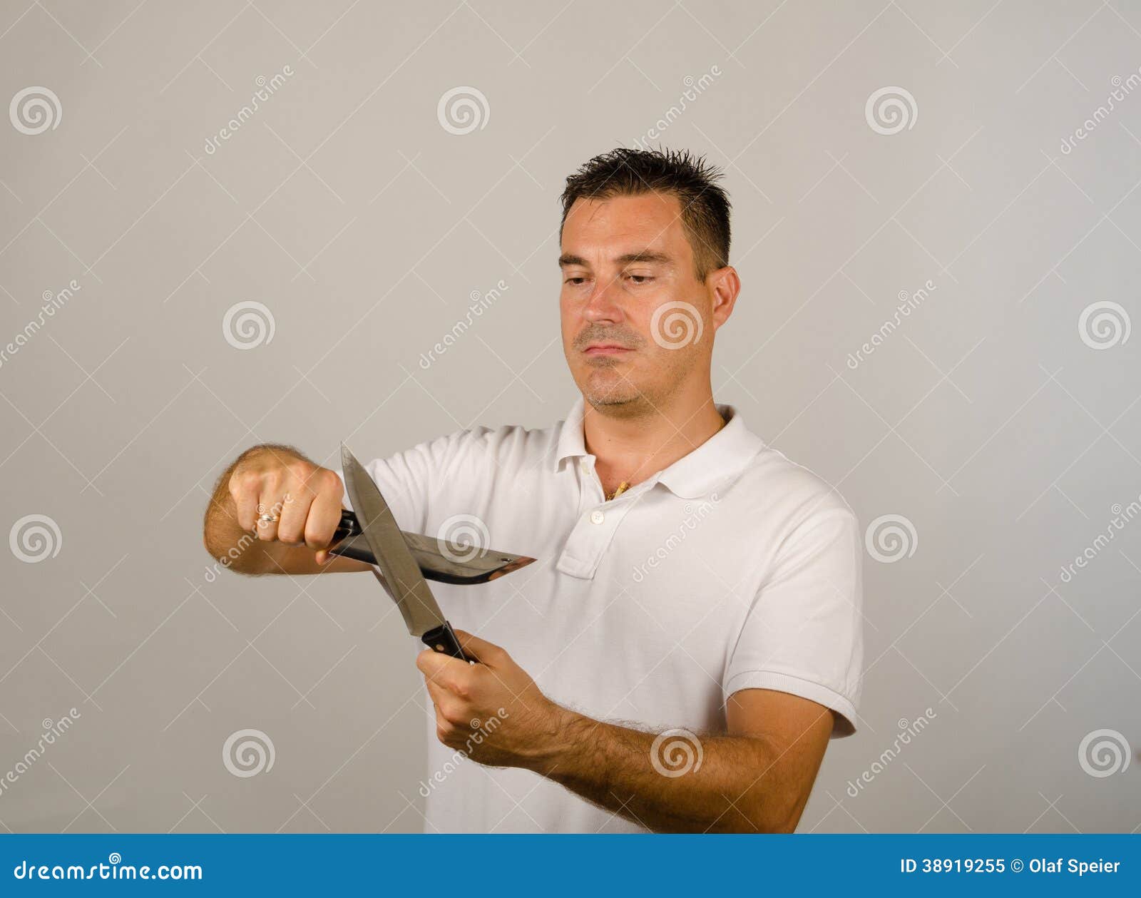 Man with kitchen knives stock image. Image of household - 38919255