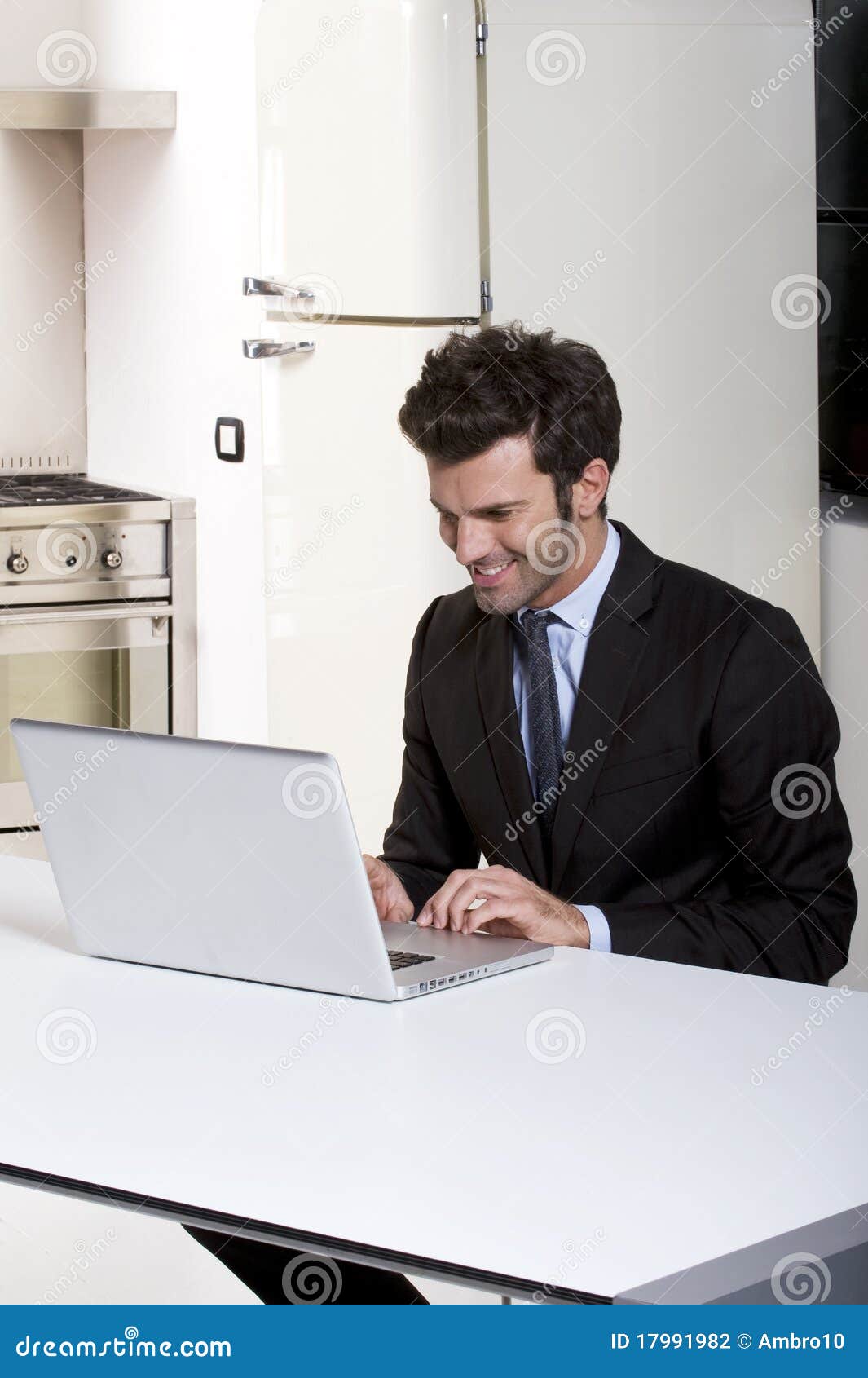 Man in the Kitchen with Laptop Stock Photo - Image of person, people ...