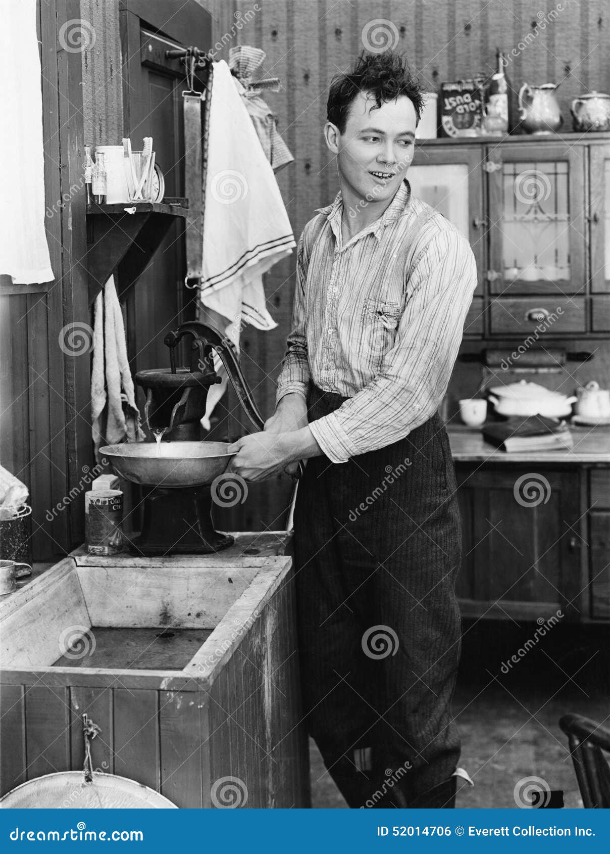 Man in a Kitchen Pumping Water Stock Photo - Image of 2530, nostalgic ...