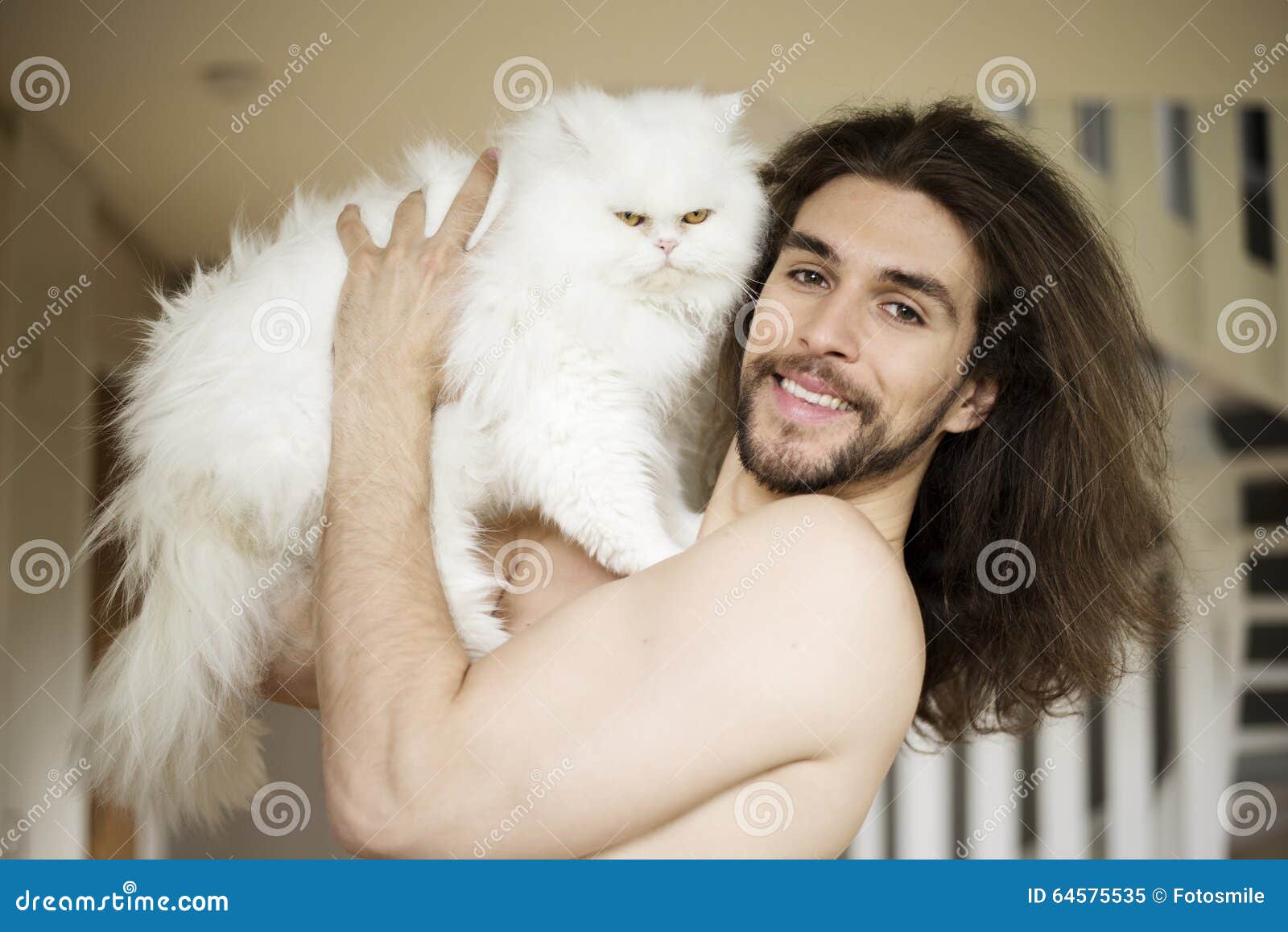 Man and kitty stock image. Image of beard, young, hair - 64575535
