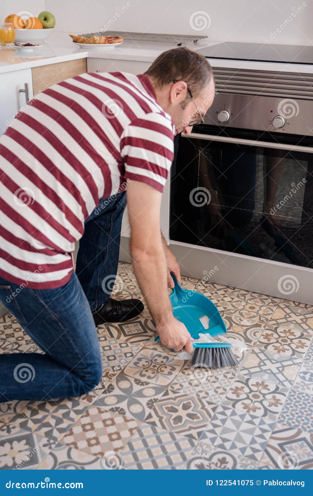 Man Bending a Sweeping a Floor Stock Image - Image of caucasian, years ...