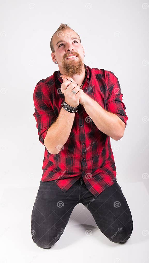 Man kneeling on the floor stock photo. Image of pose - 59432112