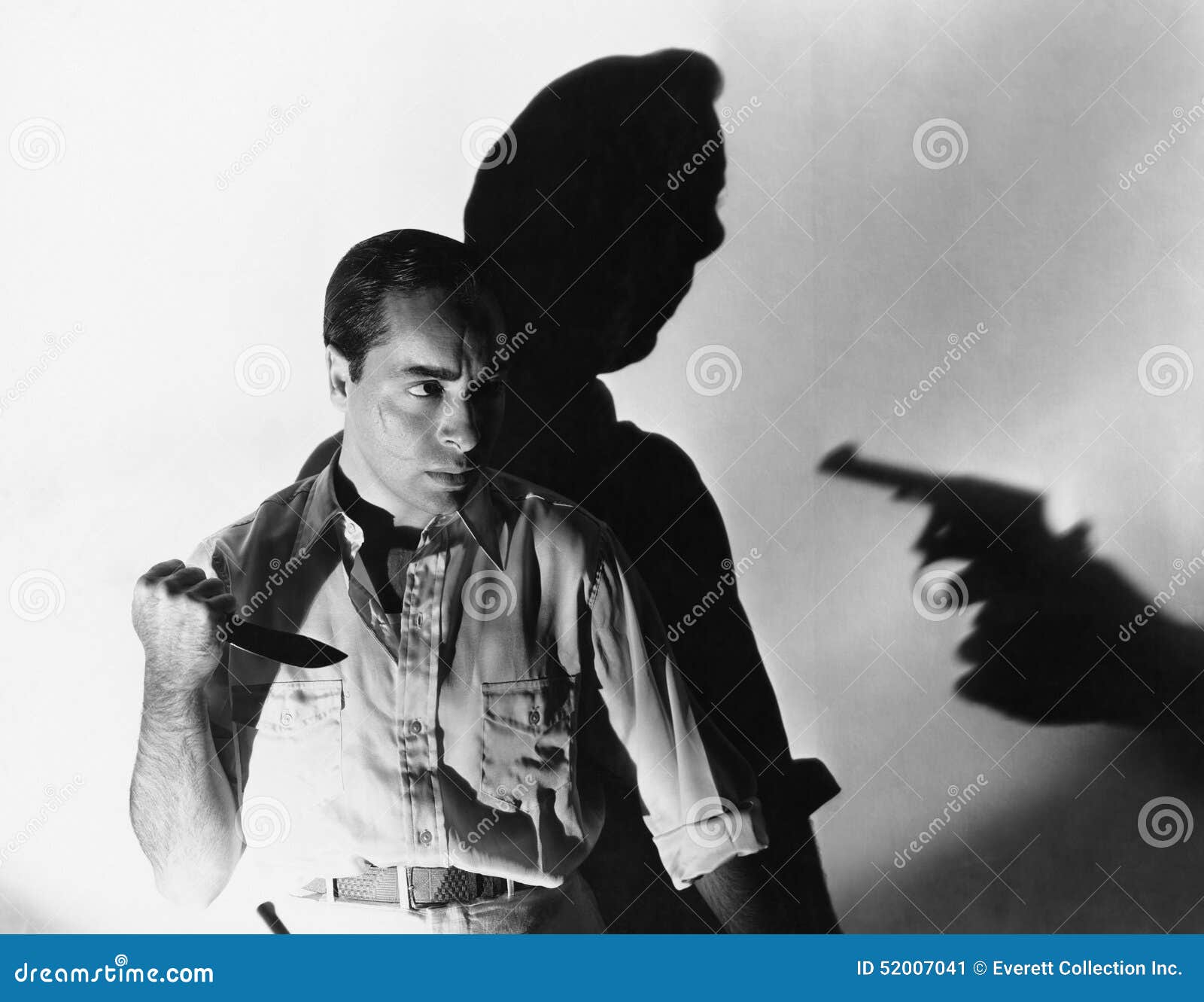 Man with knife at gunpoint stock image. Image of adult - 52007041